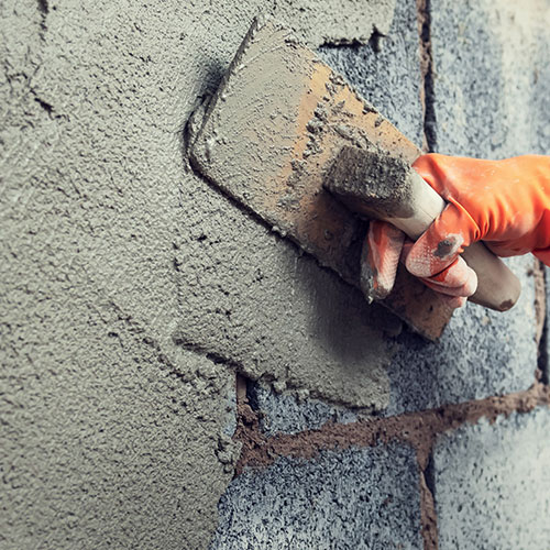 Sac de ciment, béton pret à l'emploi et mortier